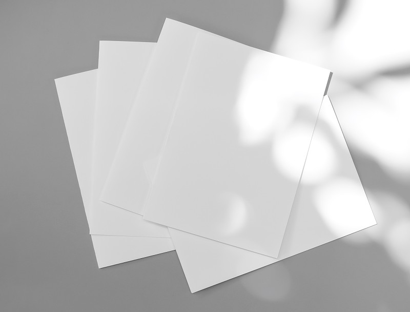 White paper mock-ups with soft shadows on gray bac_模板素材-稿定设计